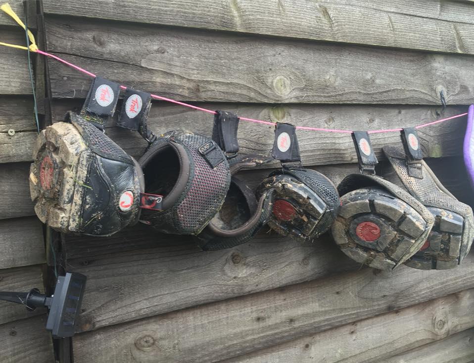 Dirty Cavallo hoof boots on rope - Colorado Horse Source